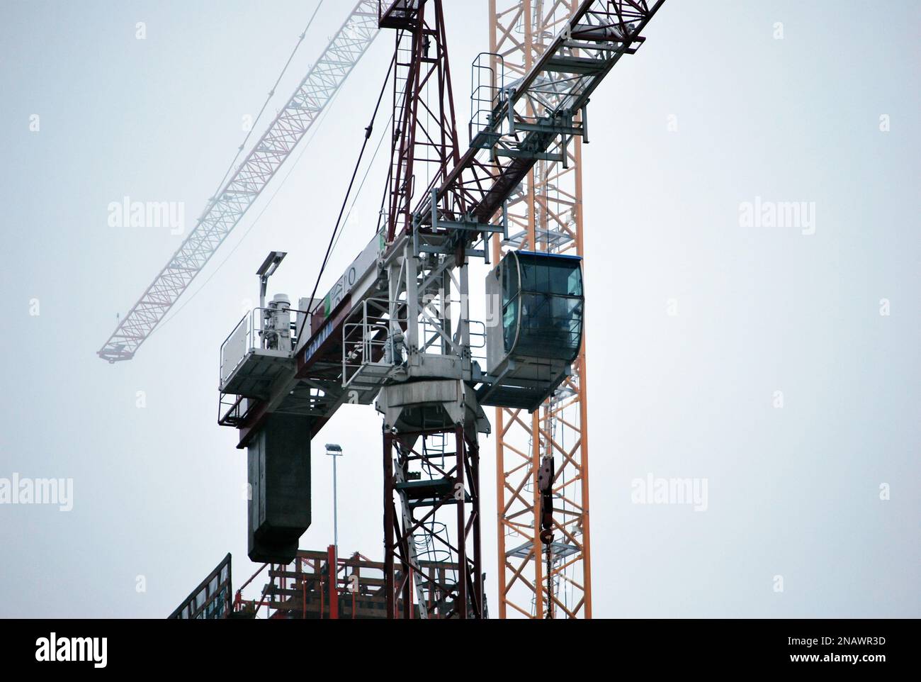 Crane in construction site, Milano Stock Photo - Alamy