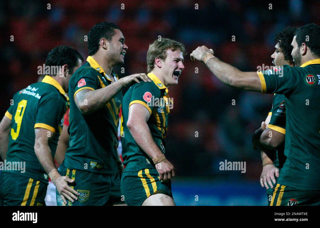Australia's Daly Cherry-Evans, center, is congratulated by team mates ...