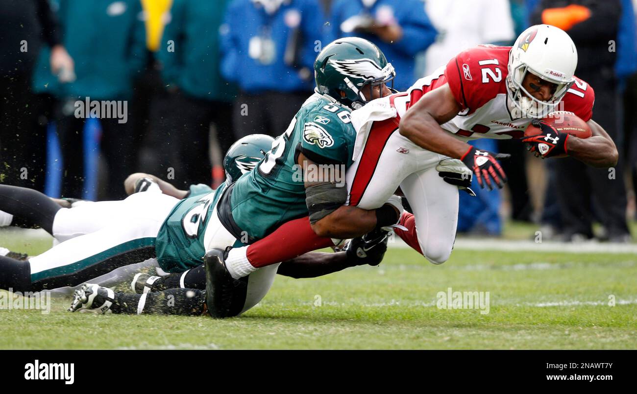 Arizona Cardinals' Andre Roberts, right, is tackled by Philadelphia ...