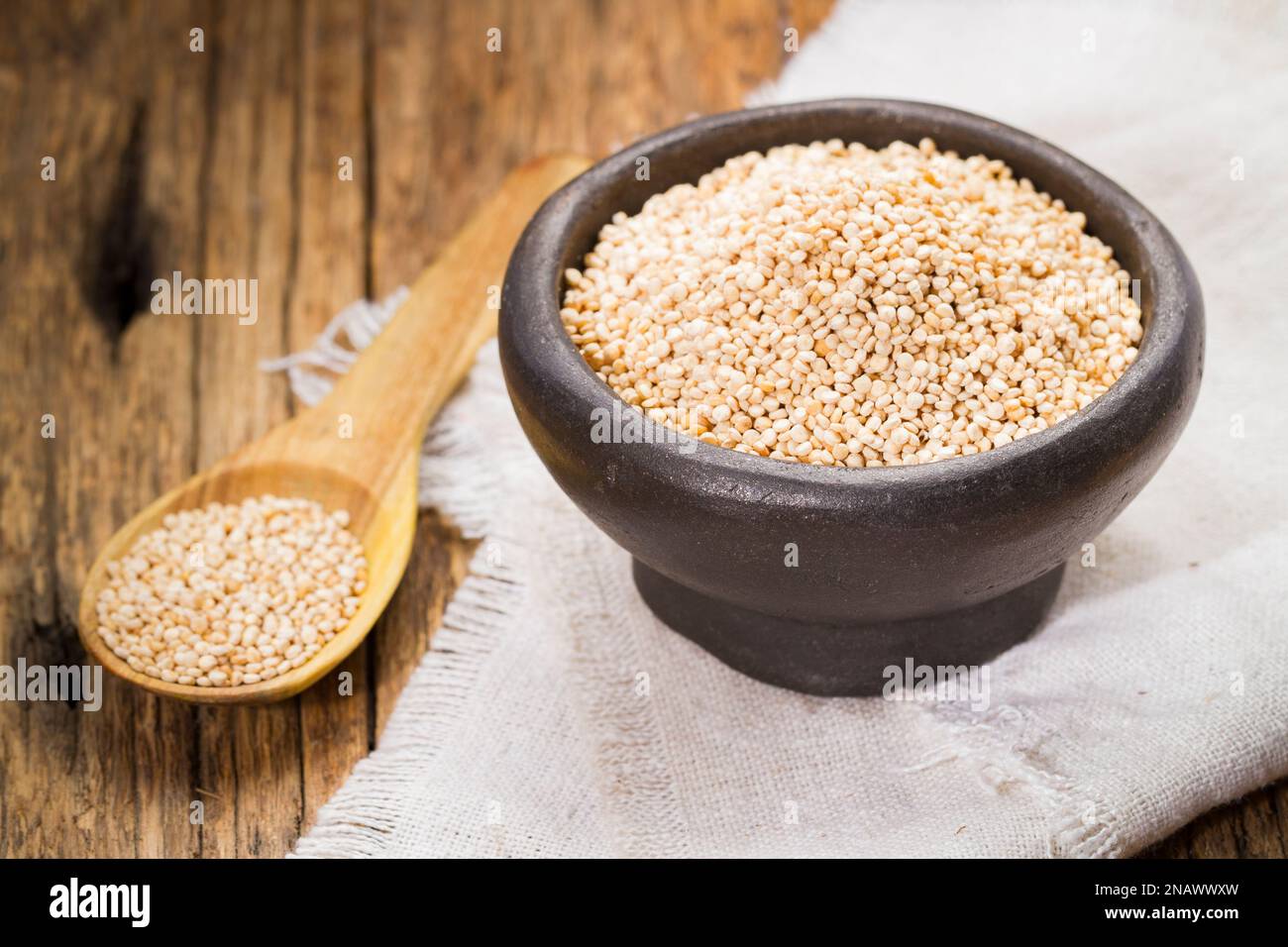 quinoa grains in container, healthy cereal, close-up image Stock Photo ...