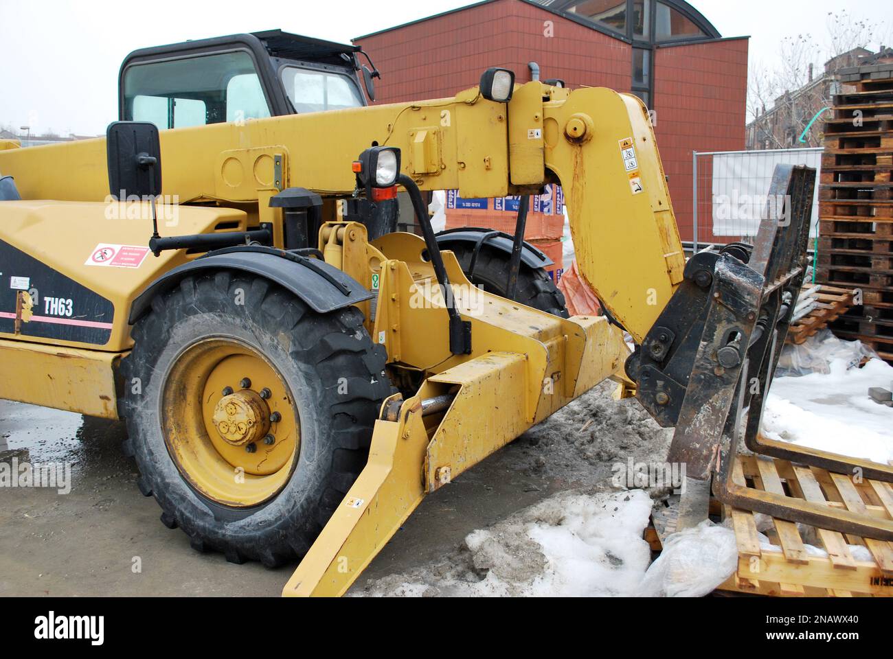 Work vehicle on a construction site, Milano Stock Photo - Alamy