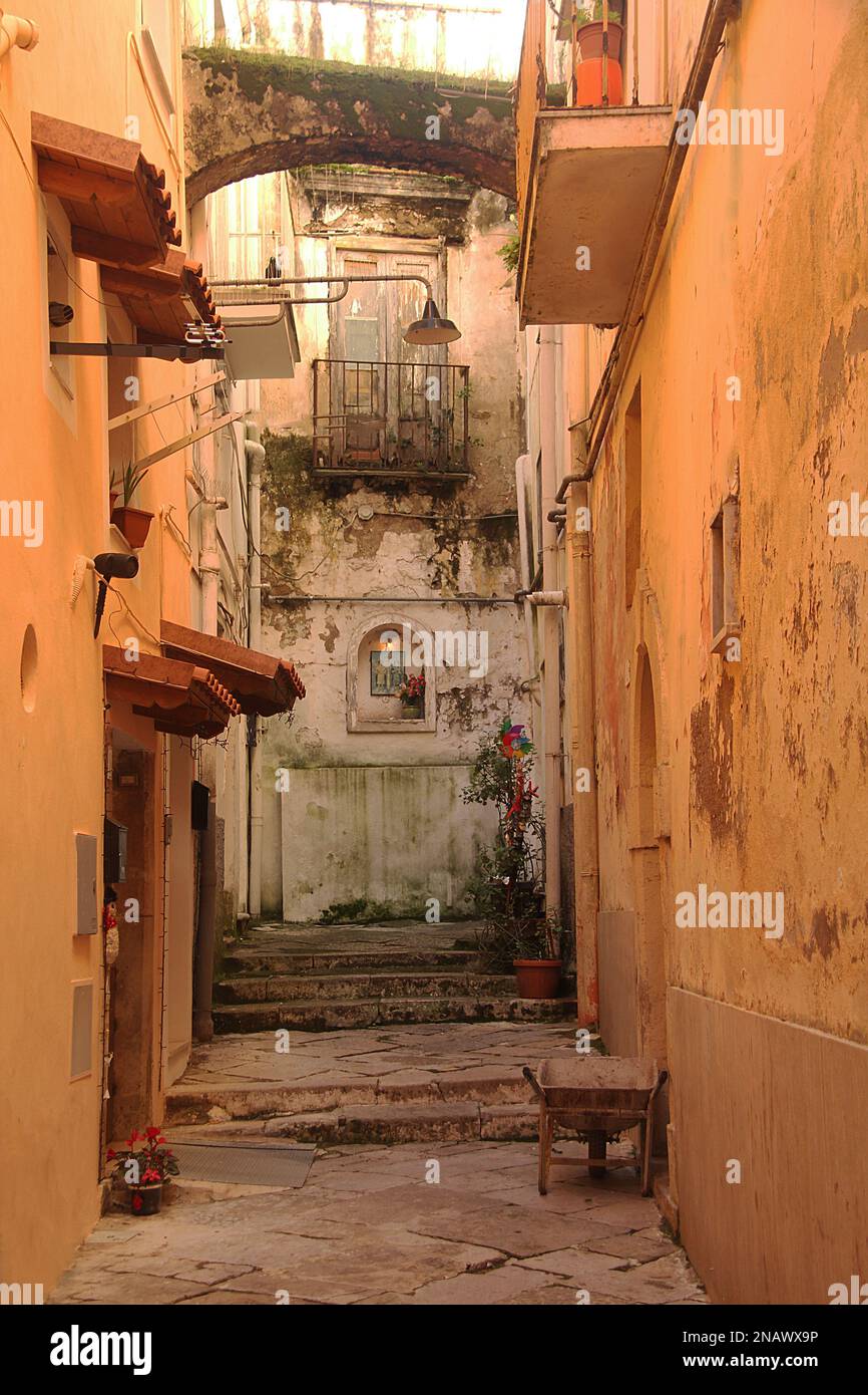 Gaeta, Italy. Narrow unkempt alleyway between residential buildings in ...