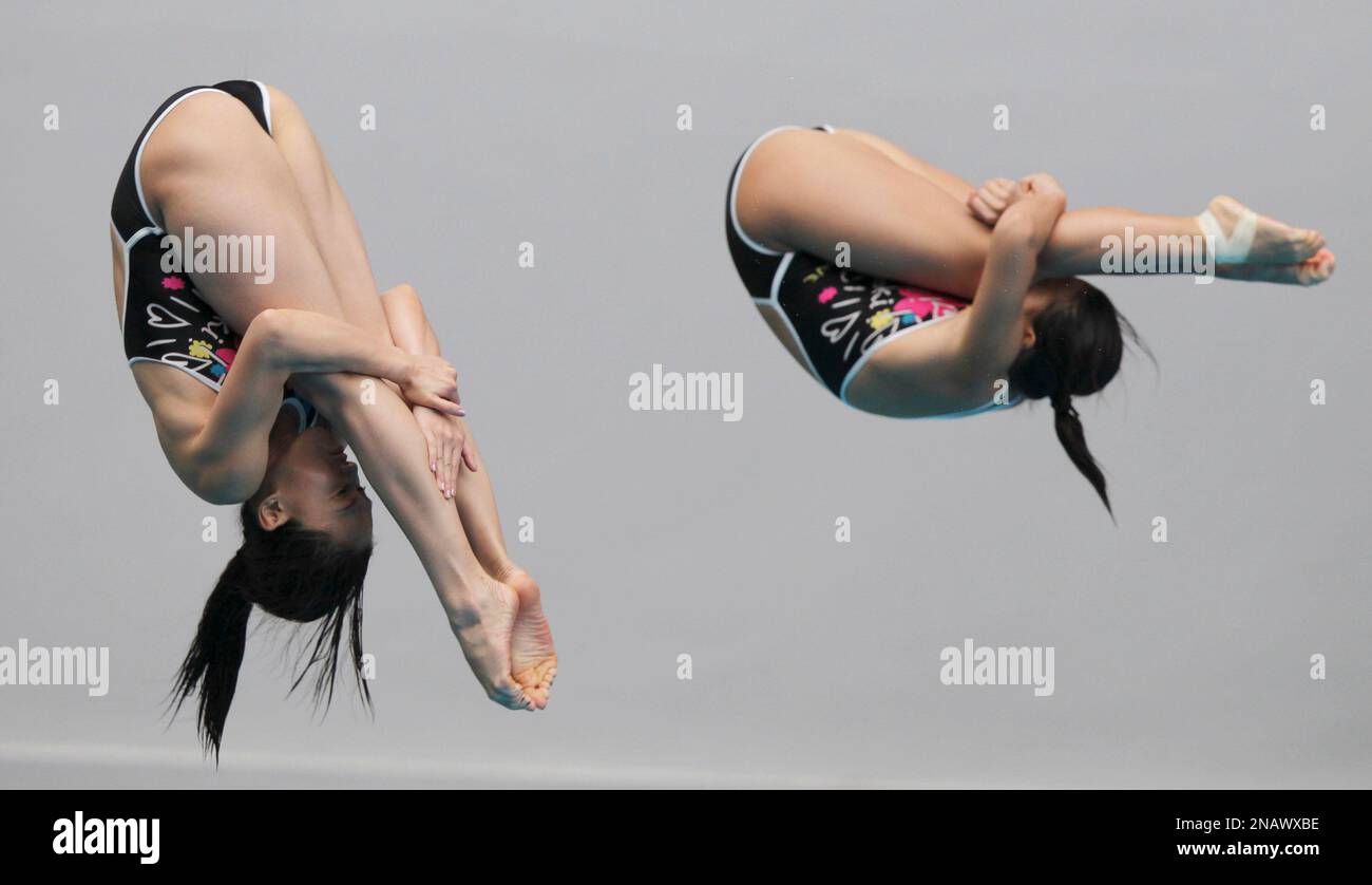 Malaysia's Leong Mun Yee, left, and Ng Yan Yee, right, compete in the ...