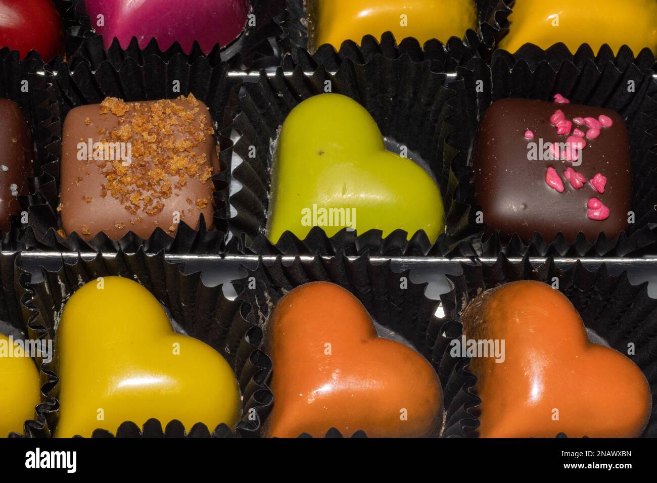 colorfull heart shaped chocolates and pralines Stock Photo - Alamy