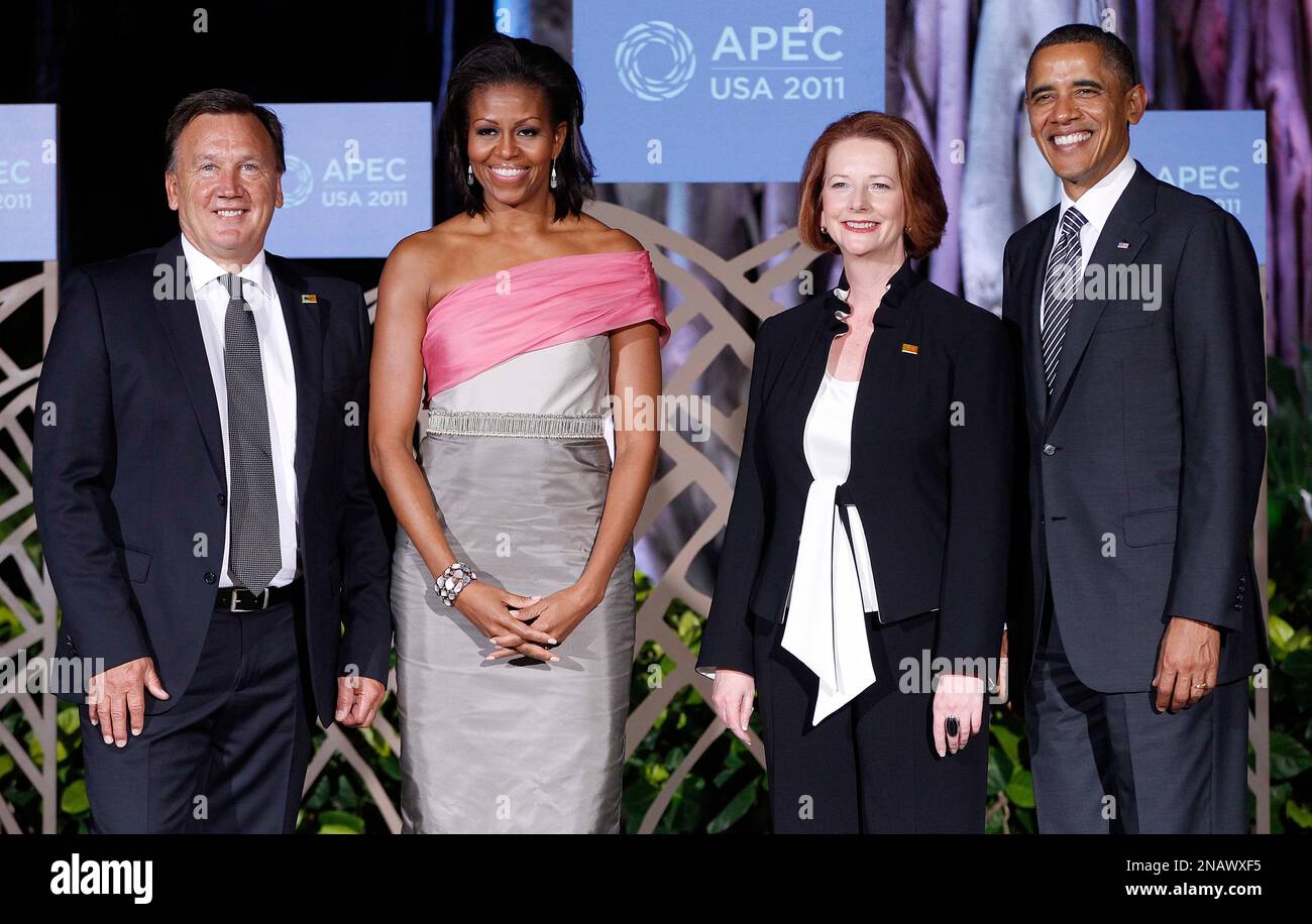 U.S. President Barack Obama and First Lady Michelle Obama greet ...