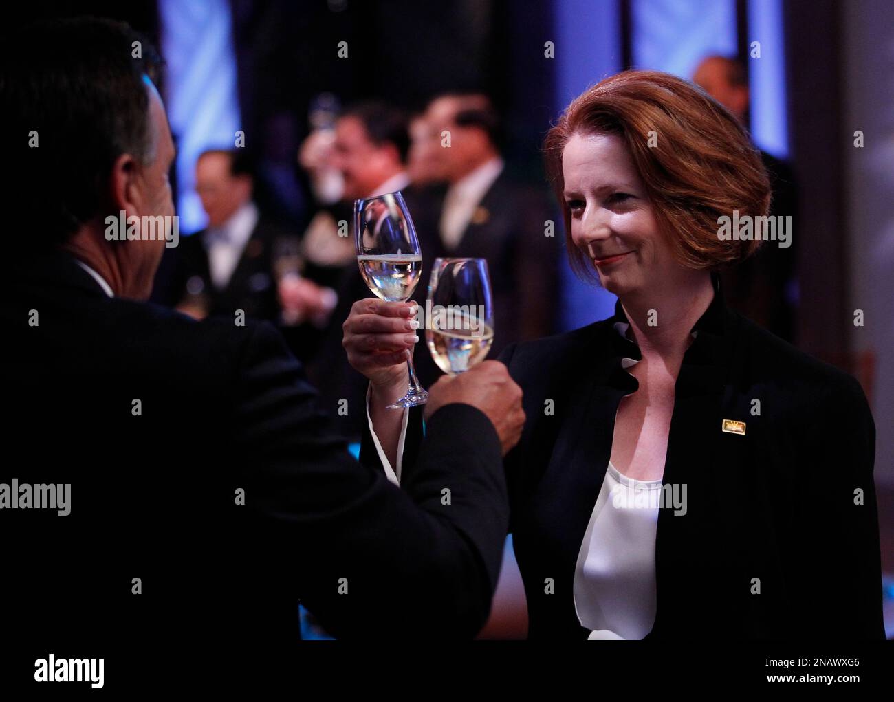 Australia Prime Minister Julia Gillard toasts her partner Tim Mathieson ...