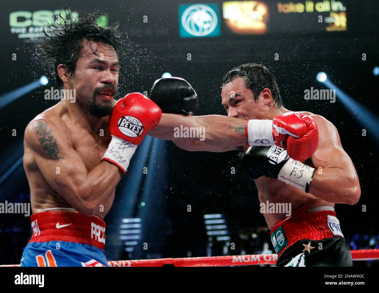 Mexico's Juan Manuel Marquez, right, hits Manny Pacquiao, of the ...