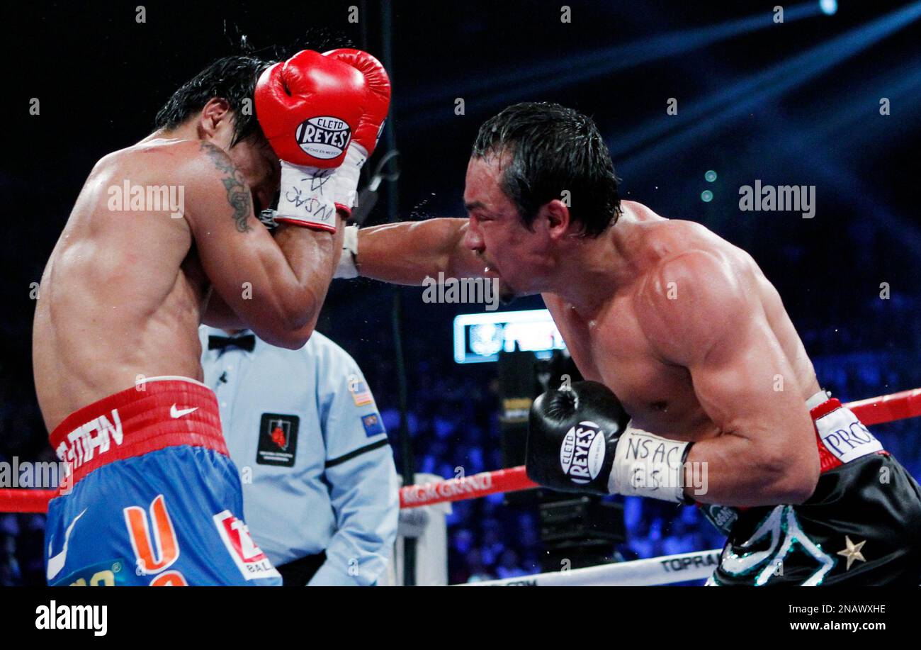 Mexico's Juan Manuel Marquez, right, hits Manny Pacquiao, of the ...