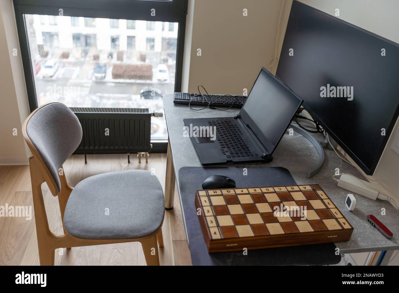 Writing and working on a laptop. Clean scene of the desk in office or ...