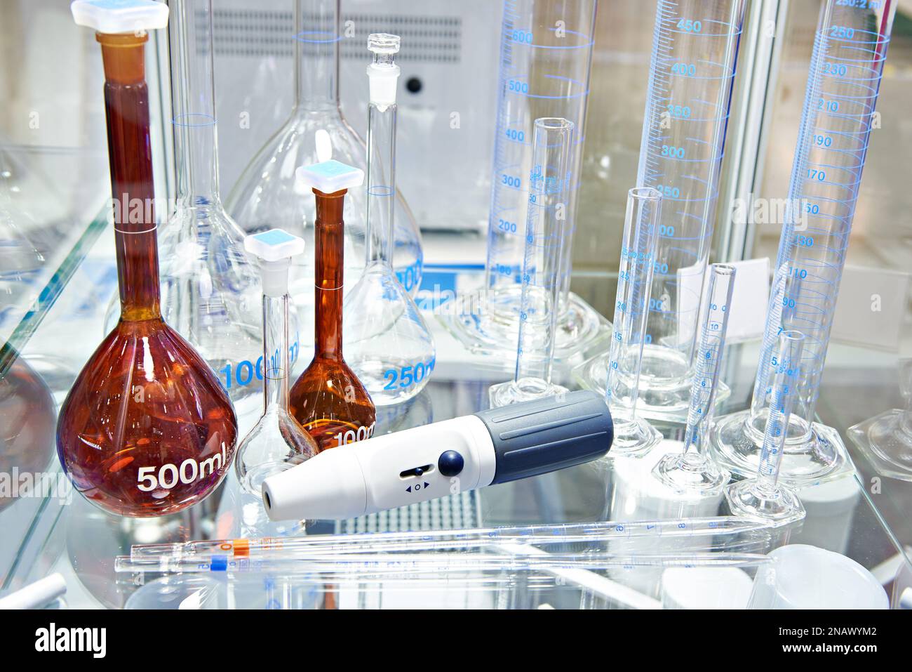 Flasks for chemical laboratory in store Stock Photo - Alamy