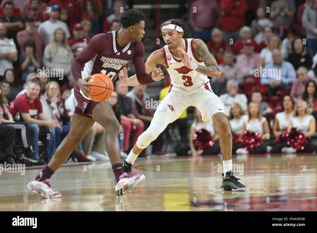 Arkansas guard Nick Smith Jr. (3) defends against Mississippi State guard Dashawn Davis (10 ...