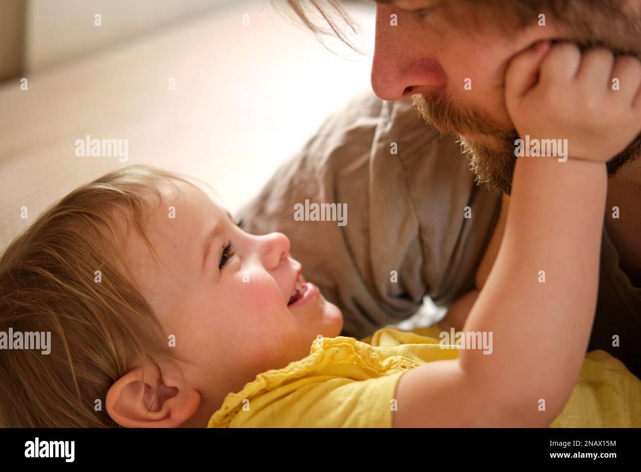 Happy Father with Daughter, Tiny Girl. One Year Baby Smiling, Laughing ...
