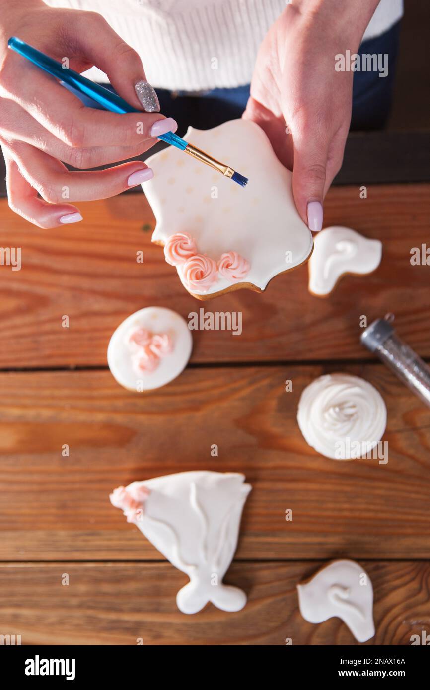 Gingerbread coloring and decorating process Stock Photo - Alamy
