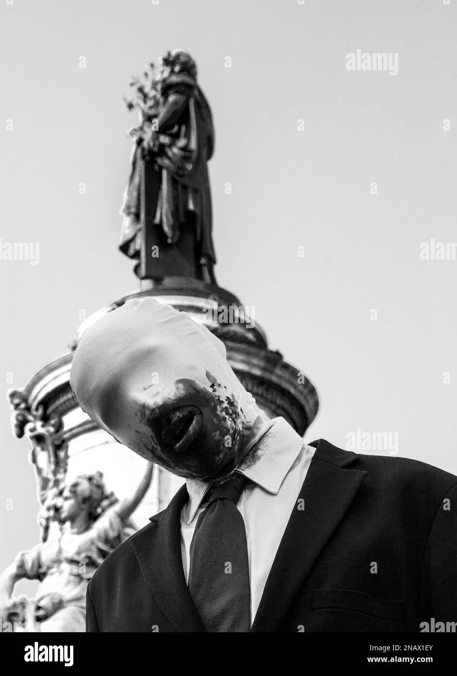 Zombie wearing business suit and red tie participating in Zombie parade ...