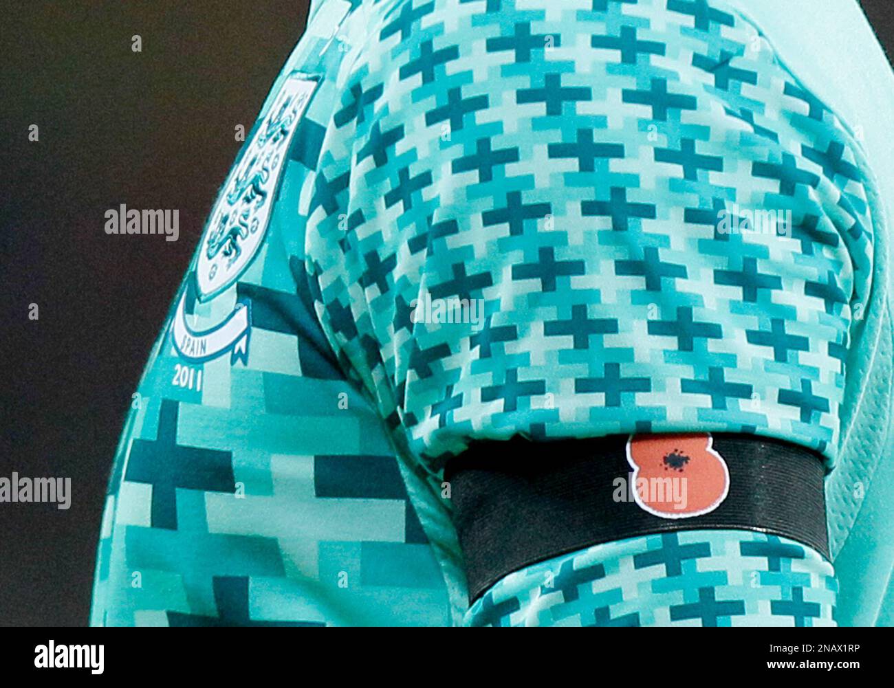 England's goalkeeper Joe Hart wears an armband displaying a poppy for ...
