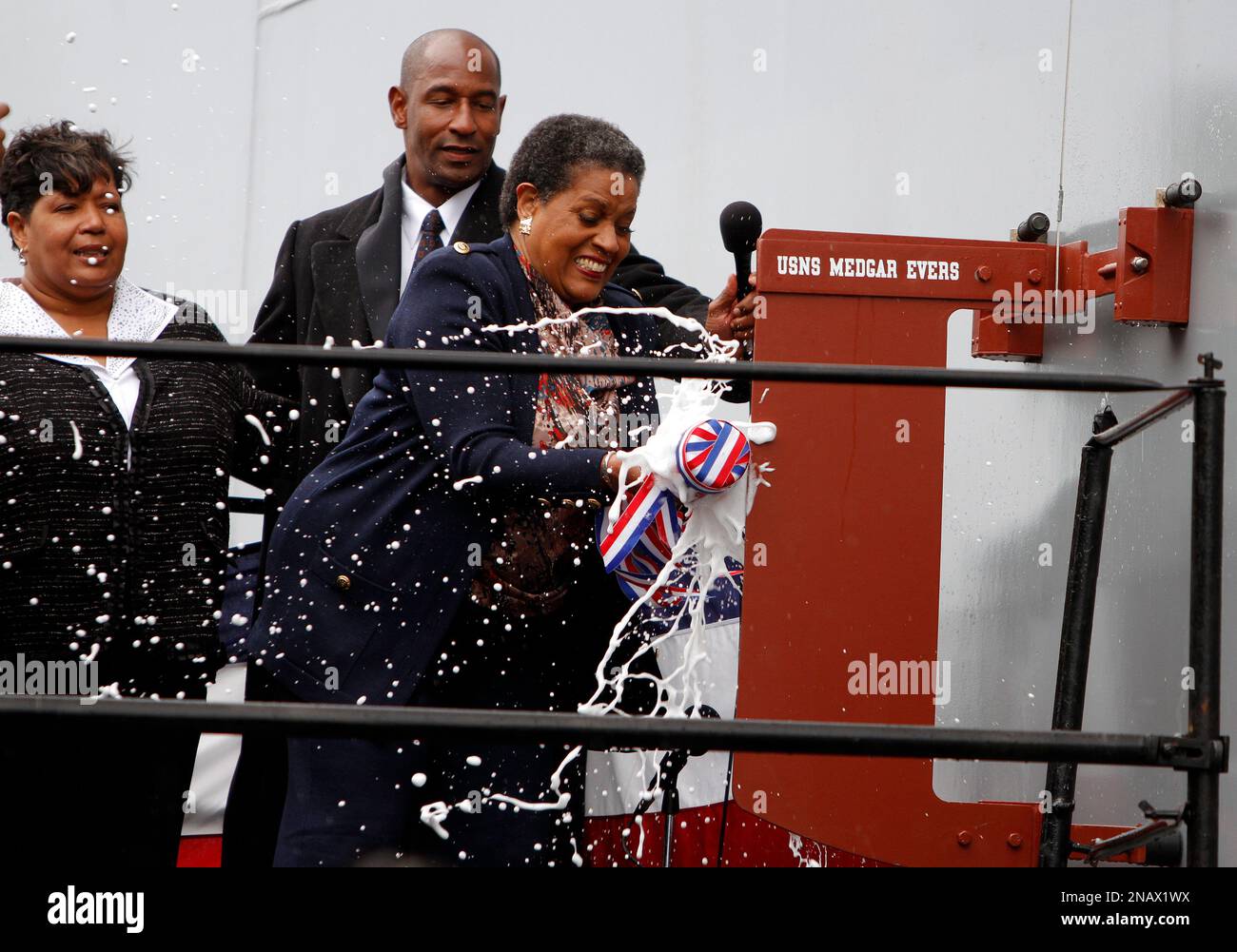 Myrlie Evers-Williams, right, christens the U.S. Navy's newest supply ...