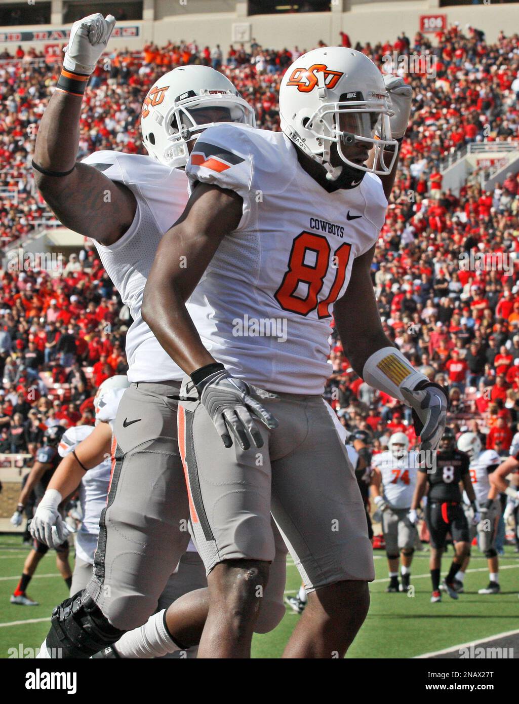 Oklahoma State wide receiver Justin Blackmon (81) and fullback Kye ...