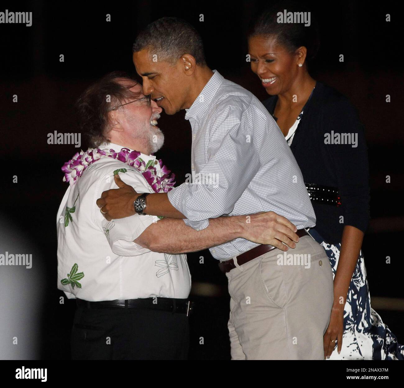 President Barack Obama and first lady Michelle Obama are welcomed by ...