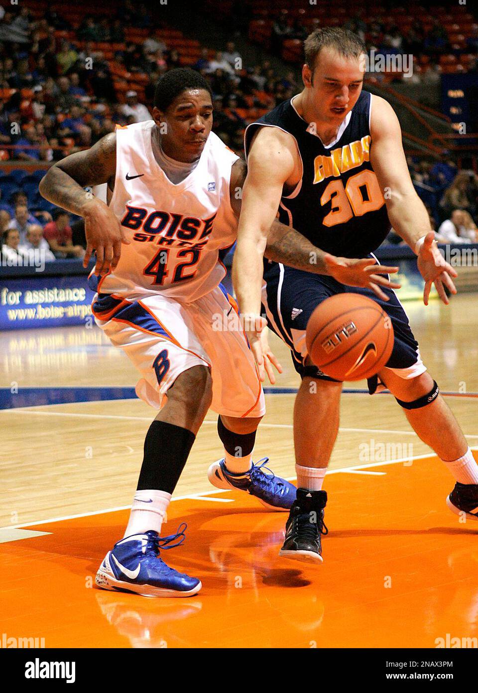 Boise State's Kenny Buckner (42) and Colorado Christian's Michael ...