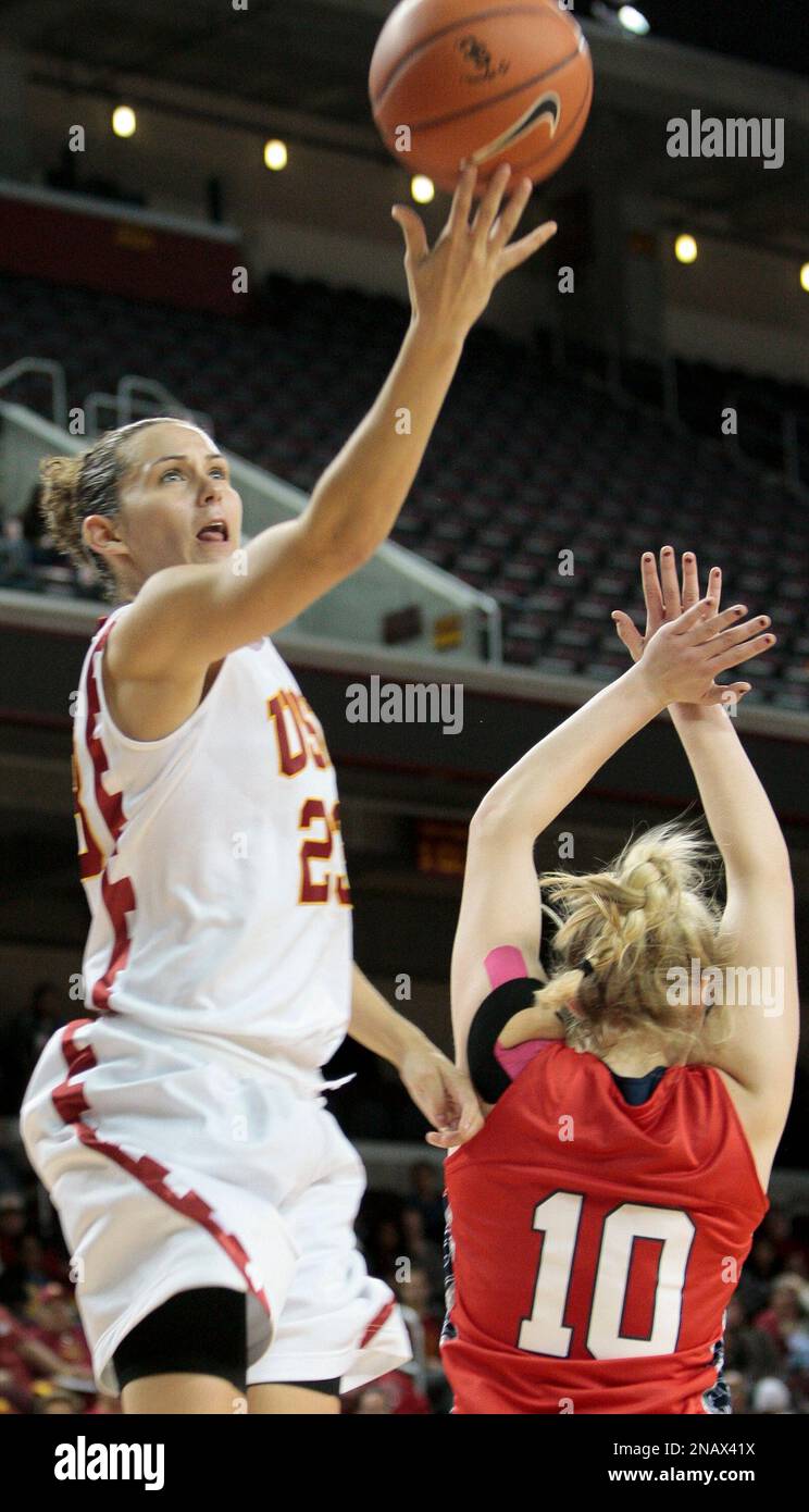 Southern California guard Jacki Gemelos, left, shoots over Fresno State ...