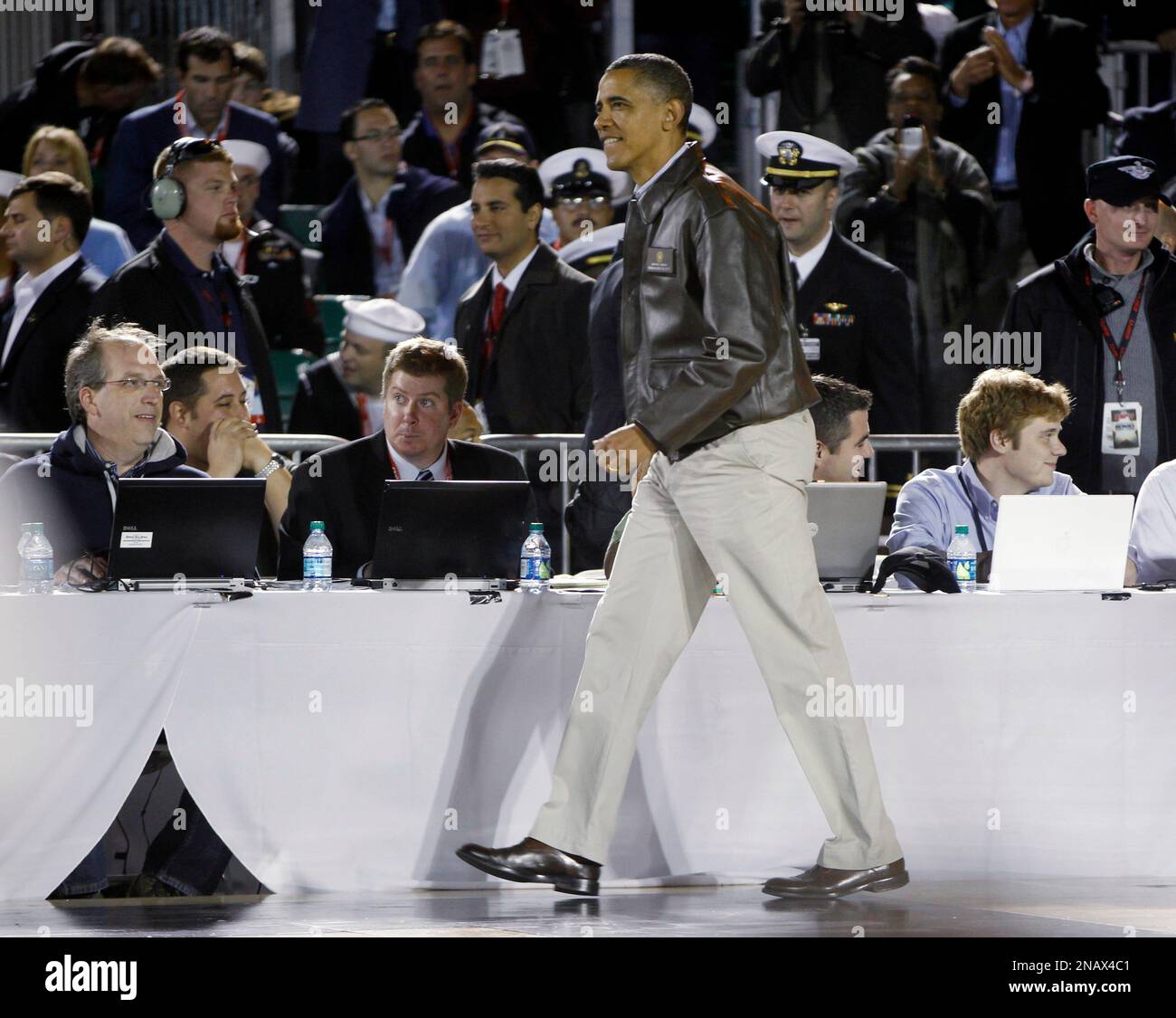 President Barack Obama walks back to his seat during the Carrier ...