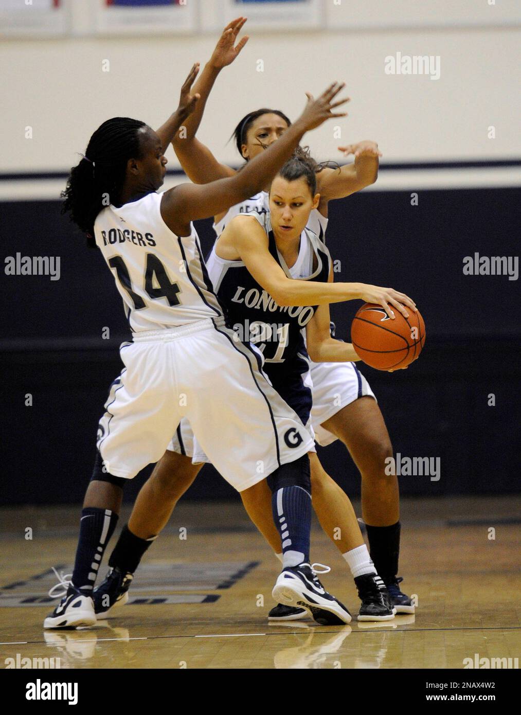 Longwood guard Mina Jovanovic (21) tries to get around Georgetown guard ...