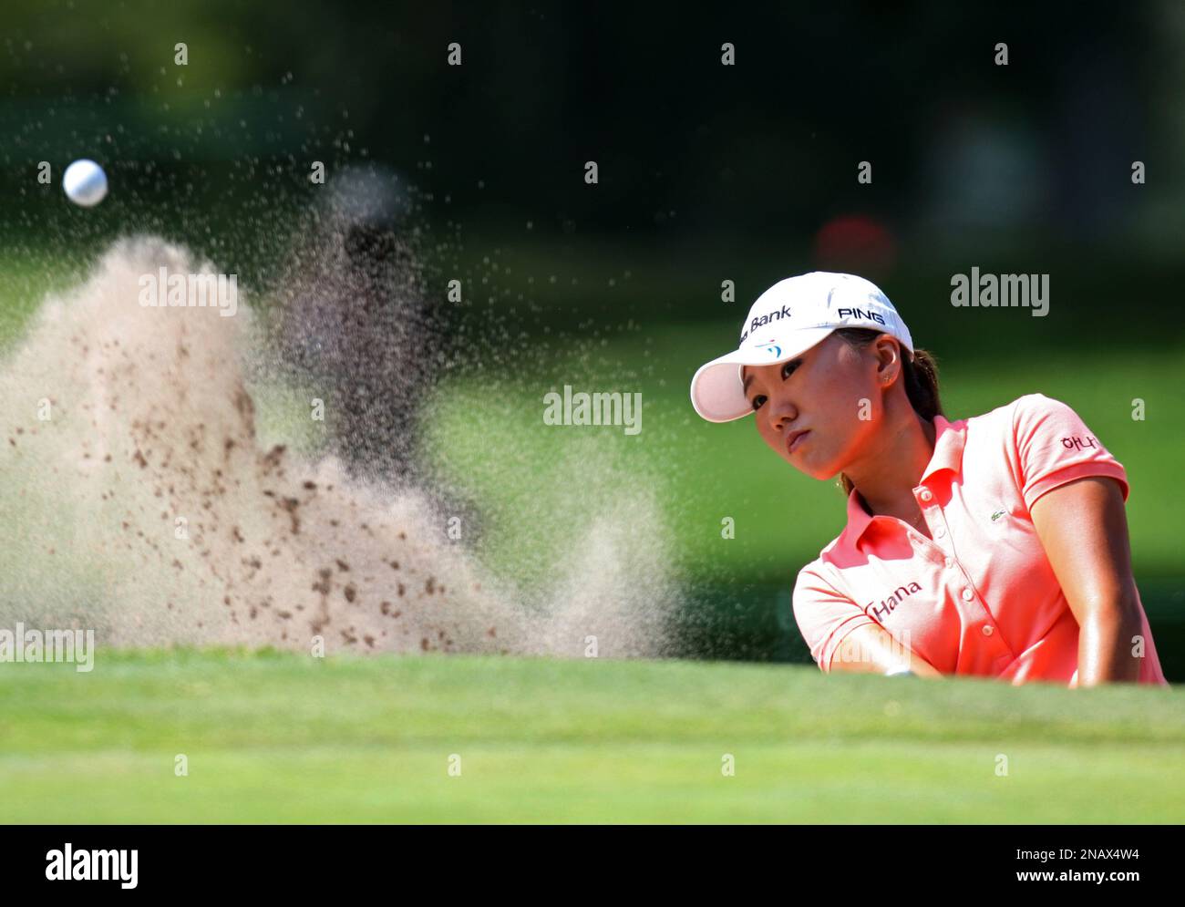 Song Hee Kim, of South Korea, plays a shot from the sand trap on the ...