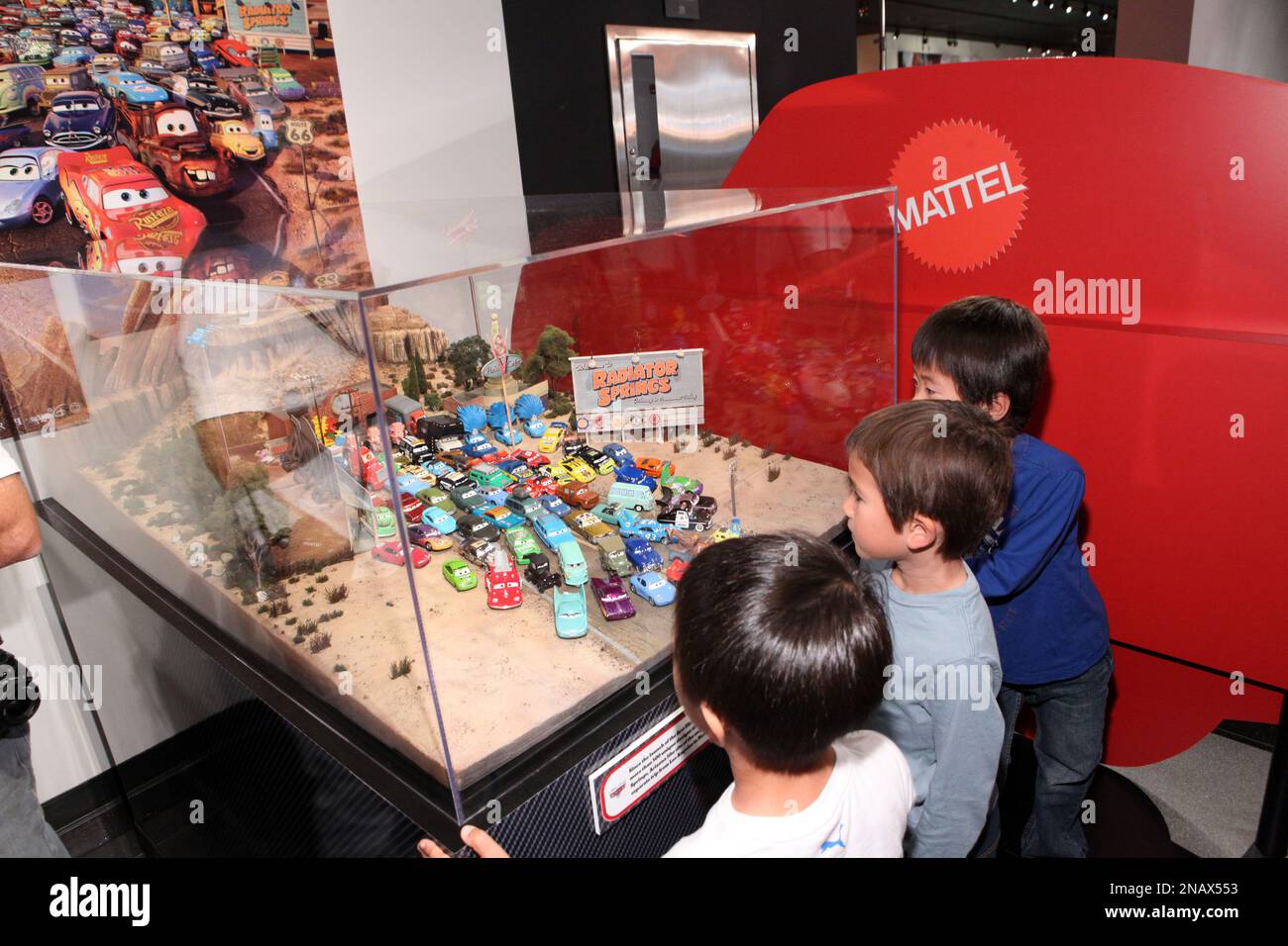 Kids check out the Mattel die-cast cars on display at the launch of the ...