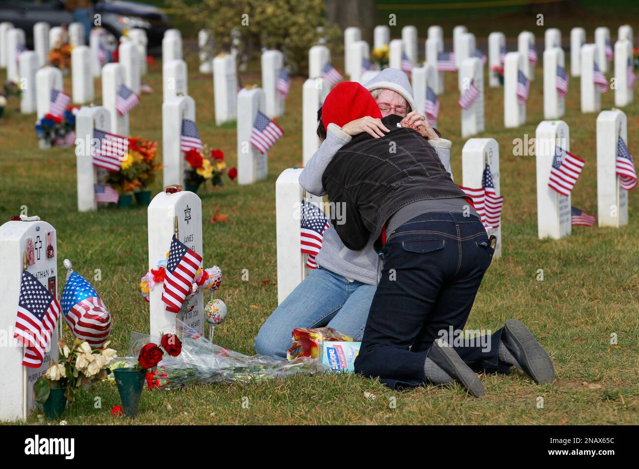 Alison Malachowski, facing camera, mother of Marines Staff Sgt. James M ...