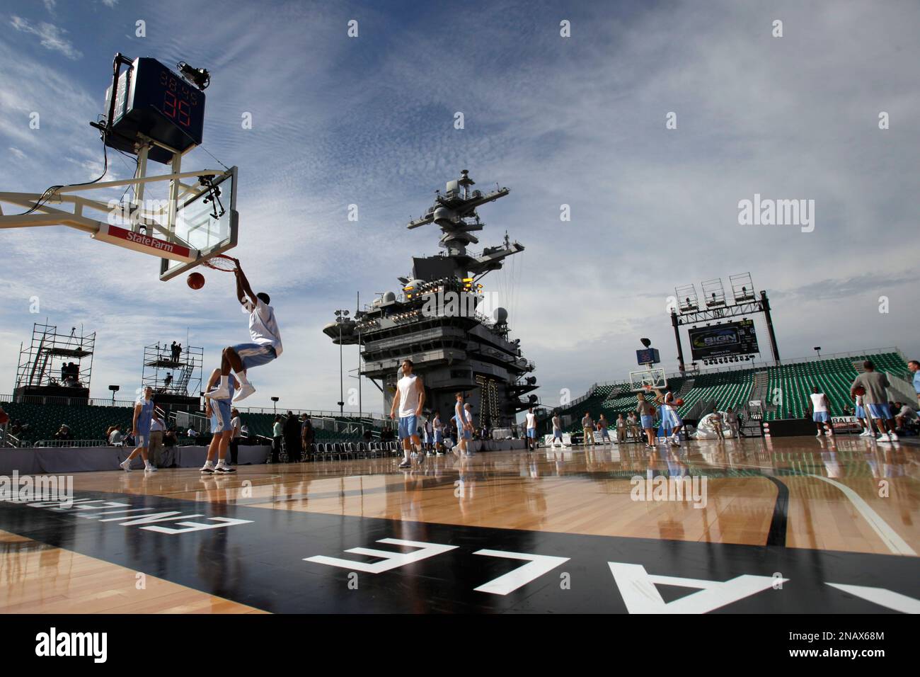 North Carolina forward Desmond Hubert, left, dunks during practice ...