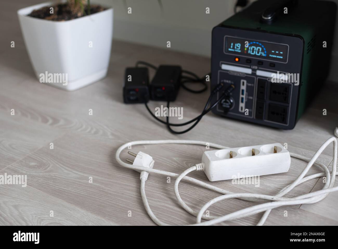 Portable Power Station is charging gadgets. Modern, information ...