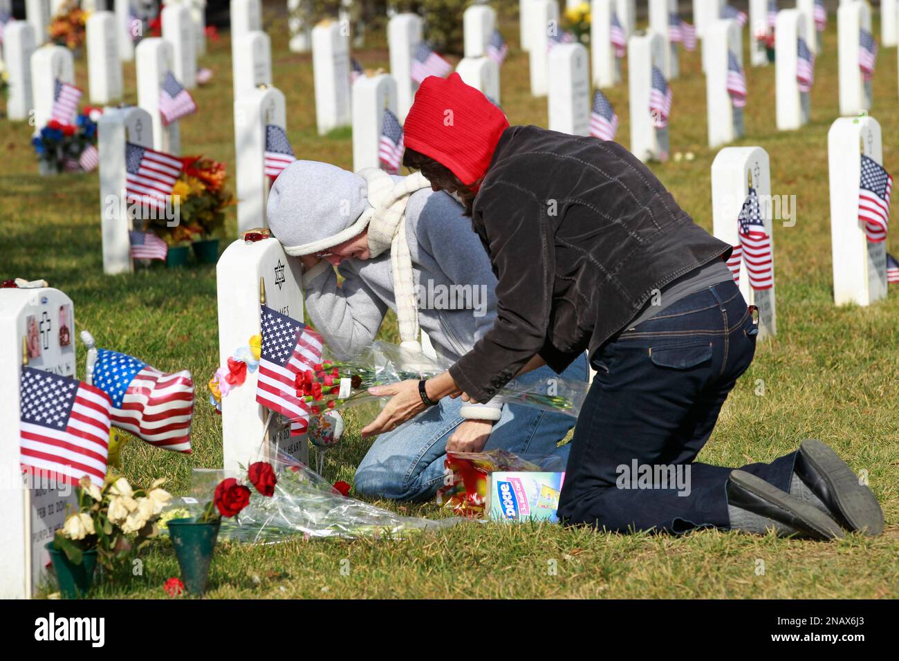 Alison Malachowski, left, mother of Marines Staff Sgt. James M ...