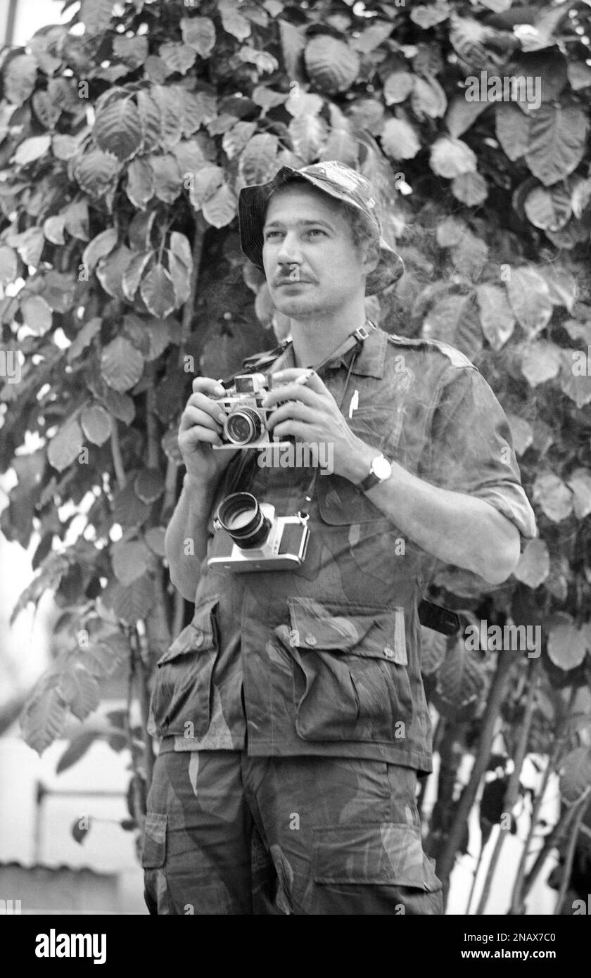 Associated Press photographer Eddie Adams in Vietnam during the Vietnam ...