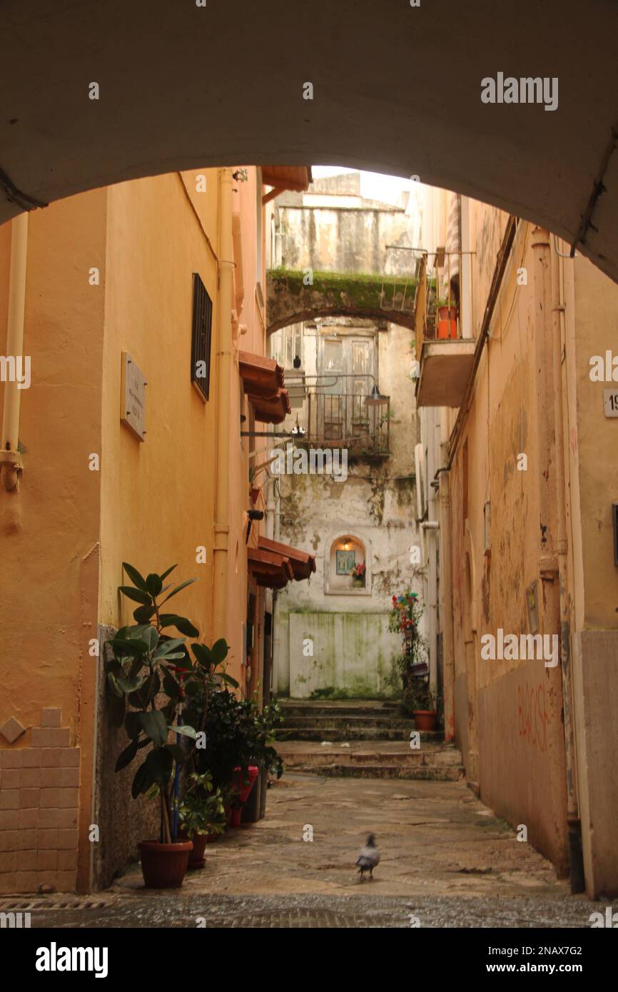 Gaeta, Italy. Narrow unkempt alleyway between residential buildings in ...