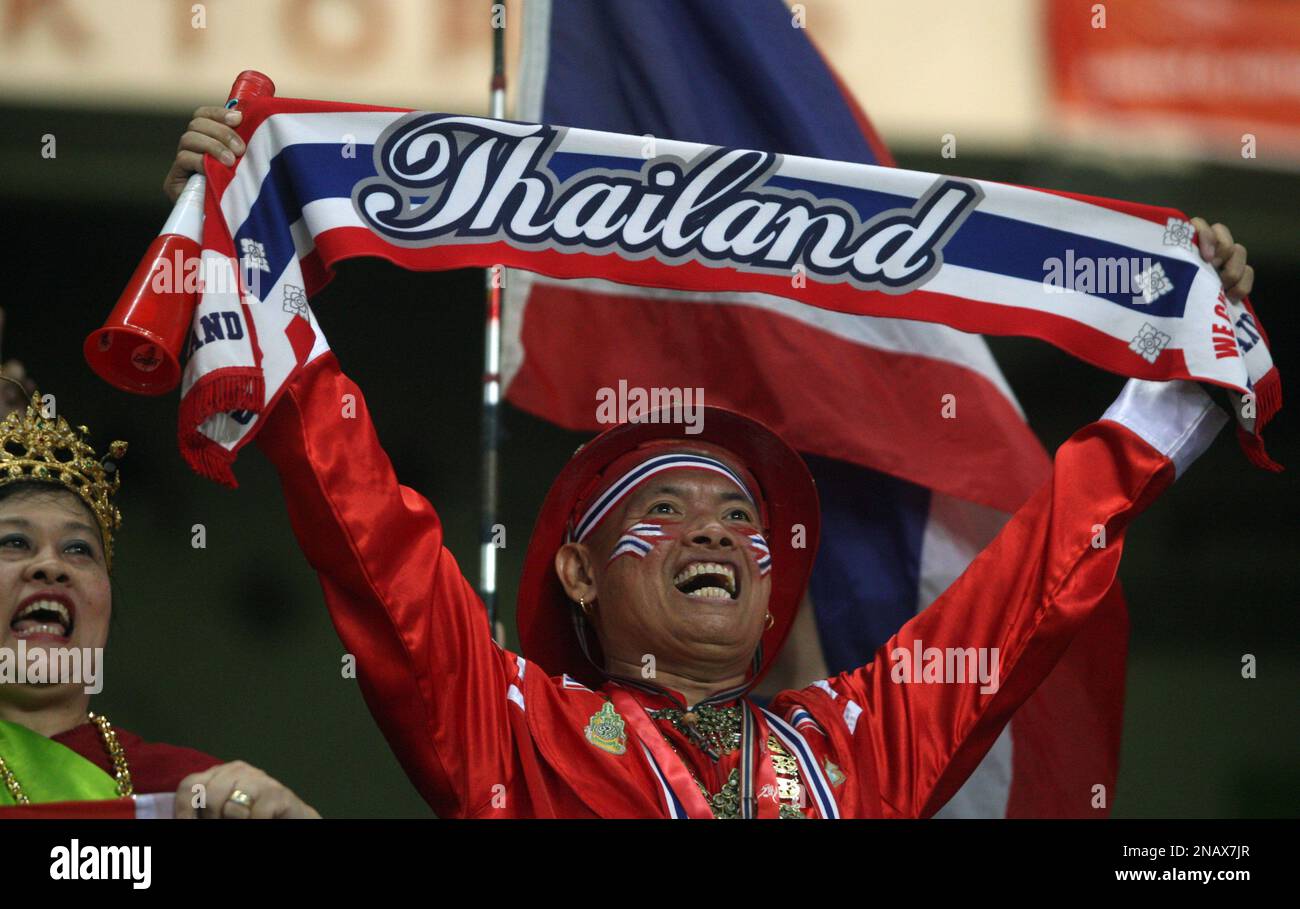 Thai supporters cheer after their team's 4-0 victory over Cambodia ...