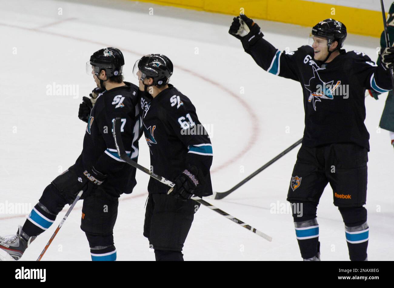 San Jose Sharks' Torrey Mitchell , left, celebrates with teammates ...