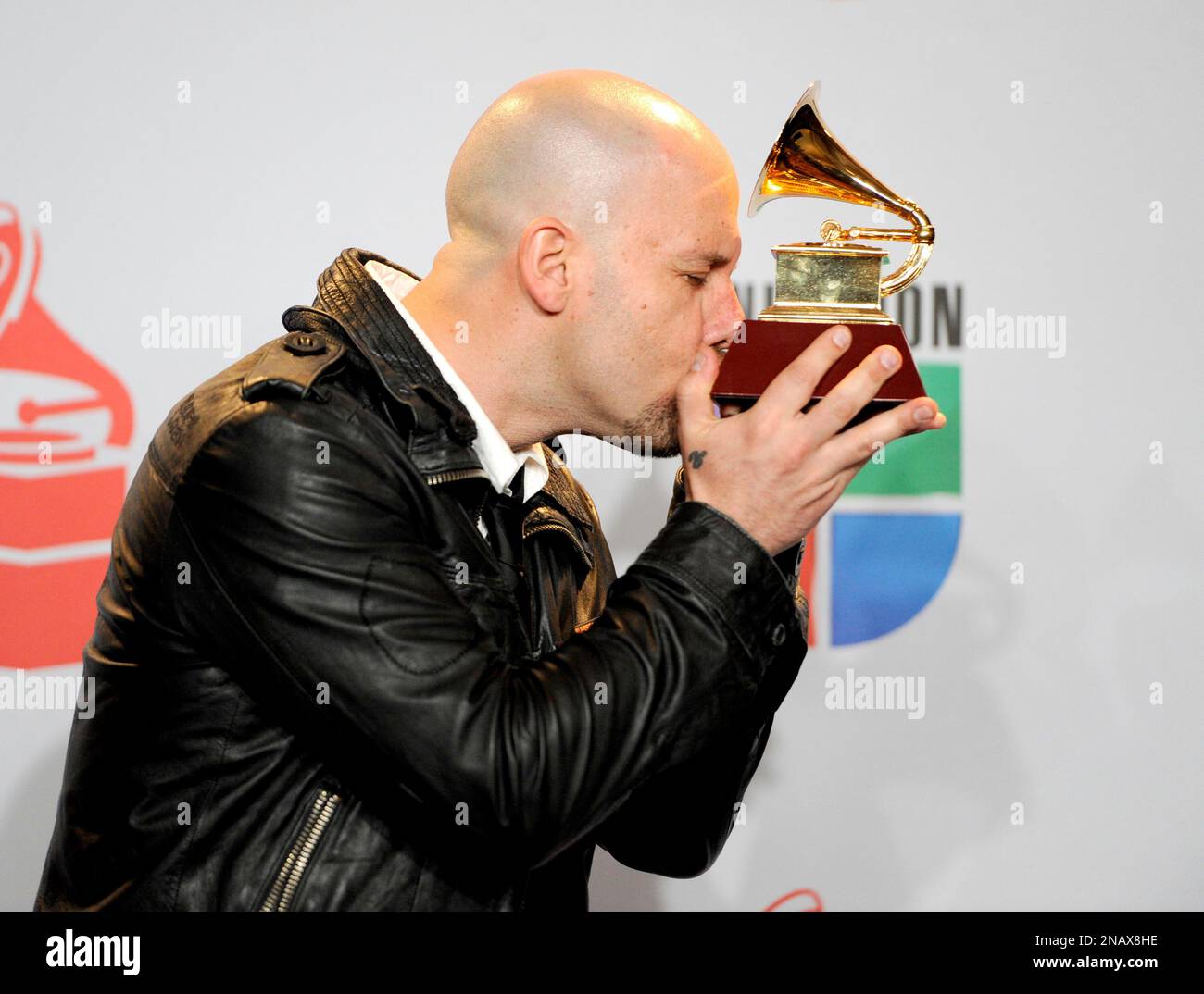 Gian Marco poses with his award for best singer songwriter album ...