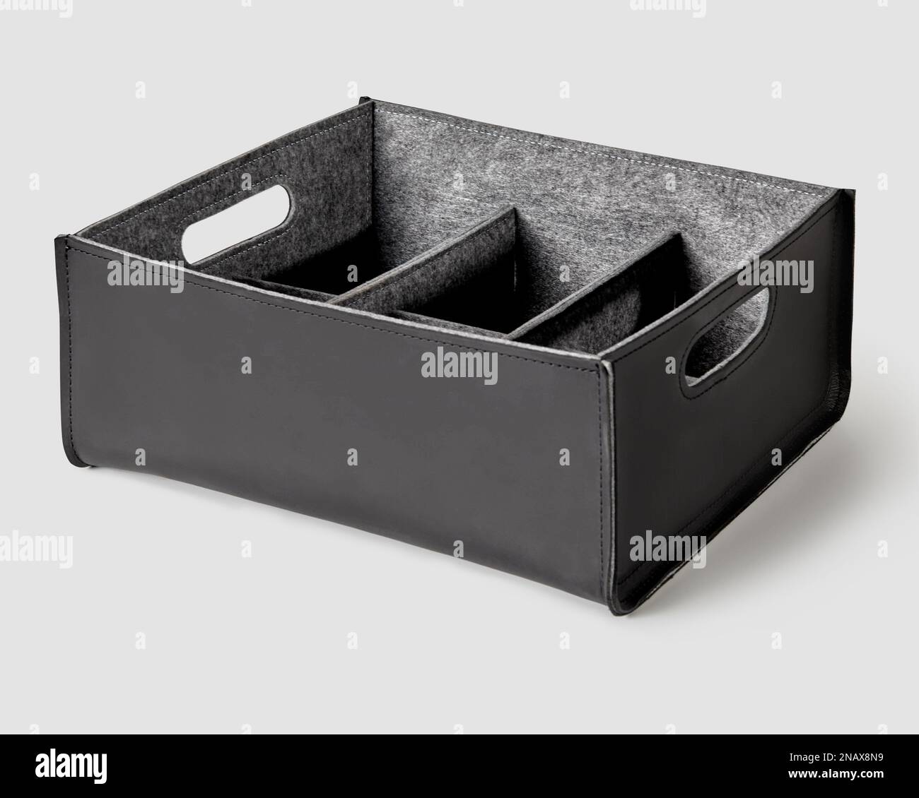 Black leather box-organizer with internal dividers and handles Stock ...