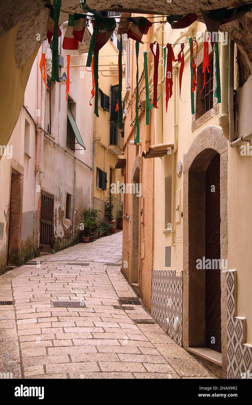 Town alleyway with flags hi-res stock photography and images - Alamy