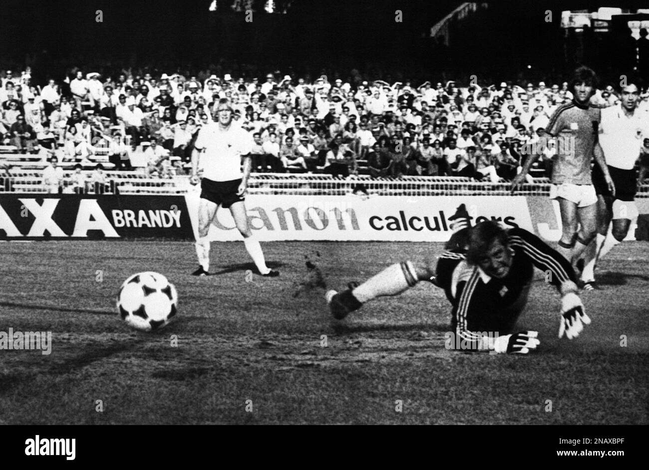 Dutch goalkeeper Piet Schrijvers, right, dives in vain to stop a goal ...