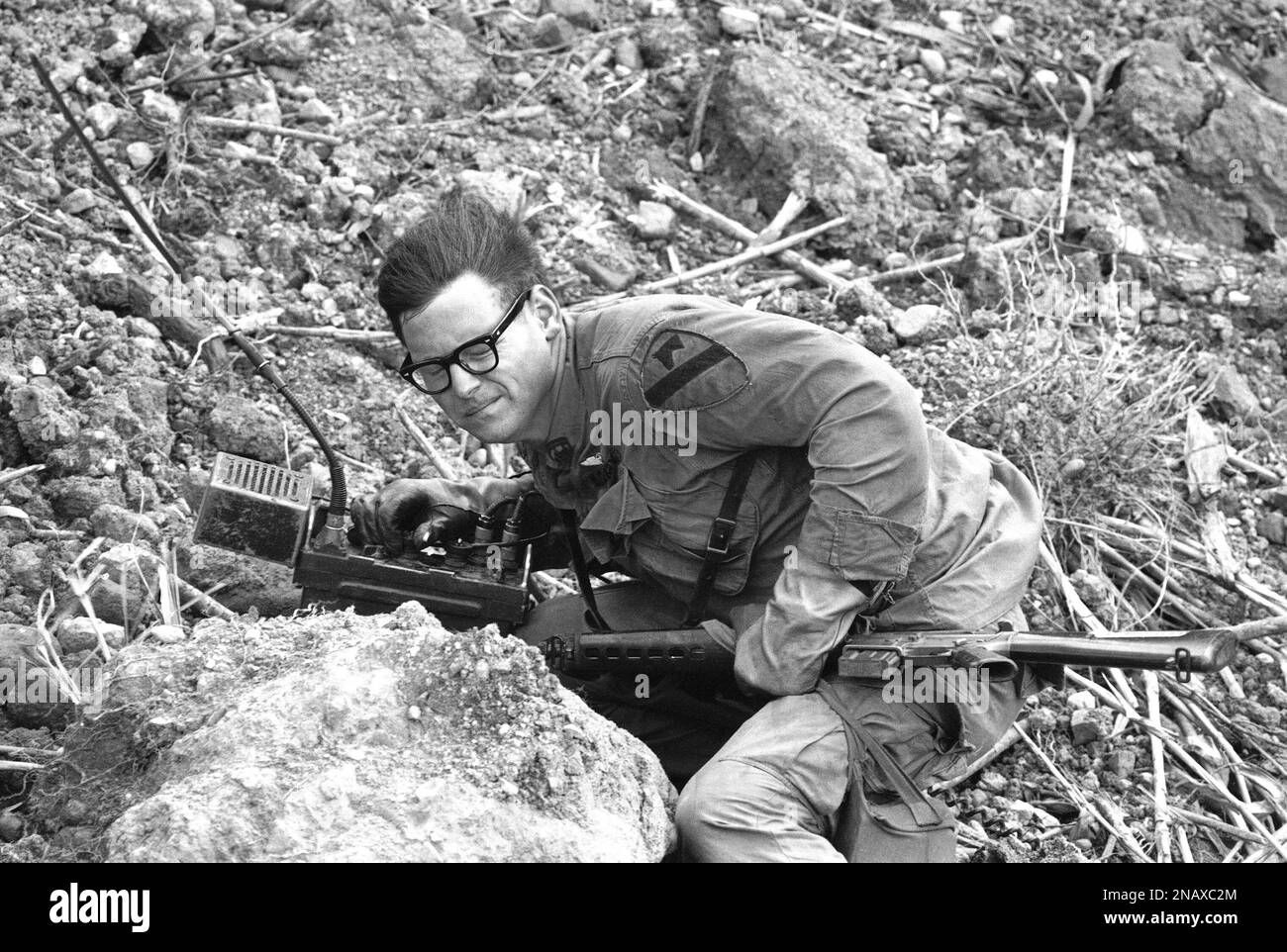A US soldier fights the wind of a helicopter landing during Operation ...