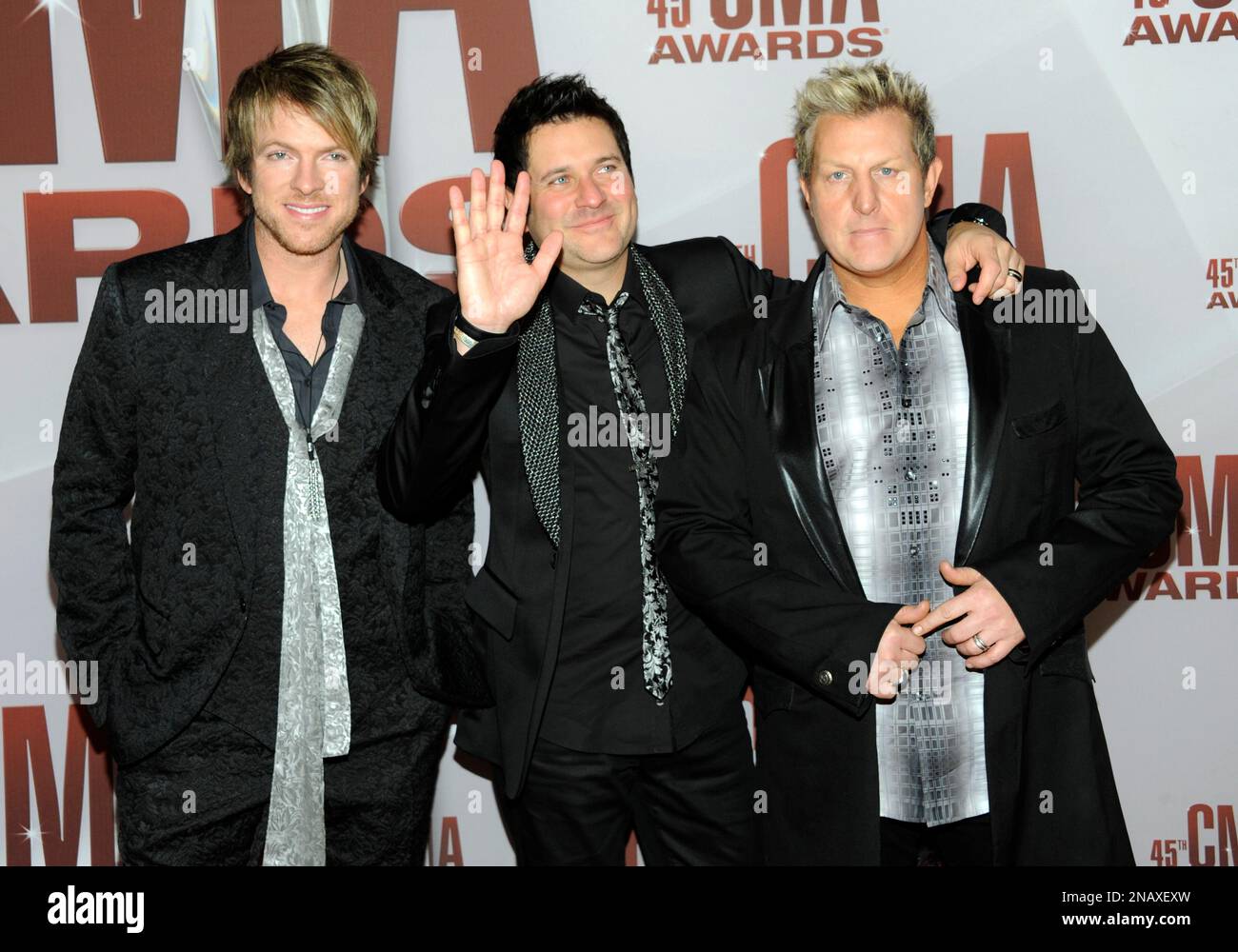 Joe Don Rooney, Jay DeMarcus and Gary LeVox of Rascal Flatts arrive at ...