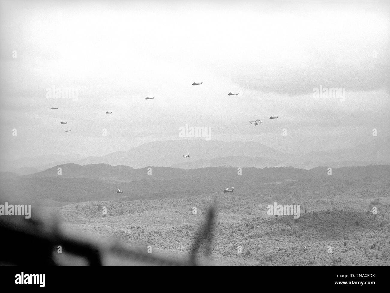 U.S. Marines helicopters landing in a dry paddy field heli-lifting ...