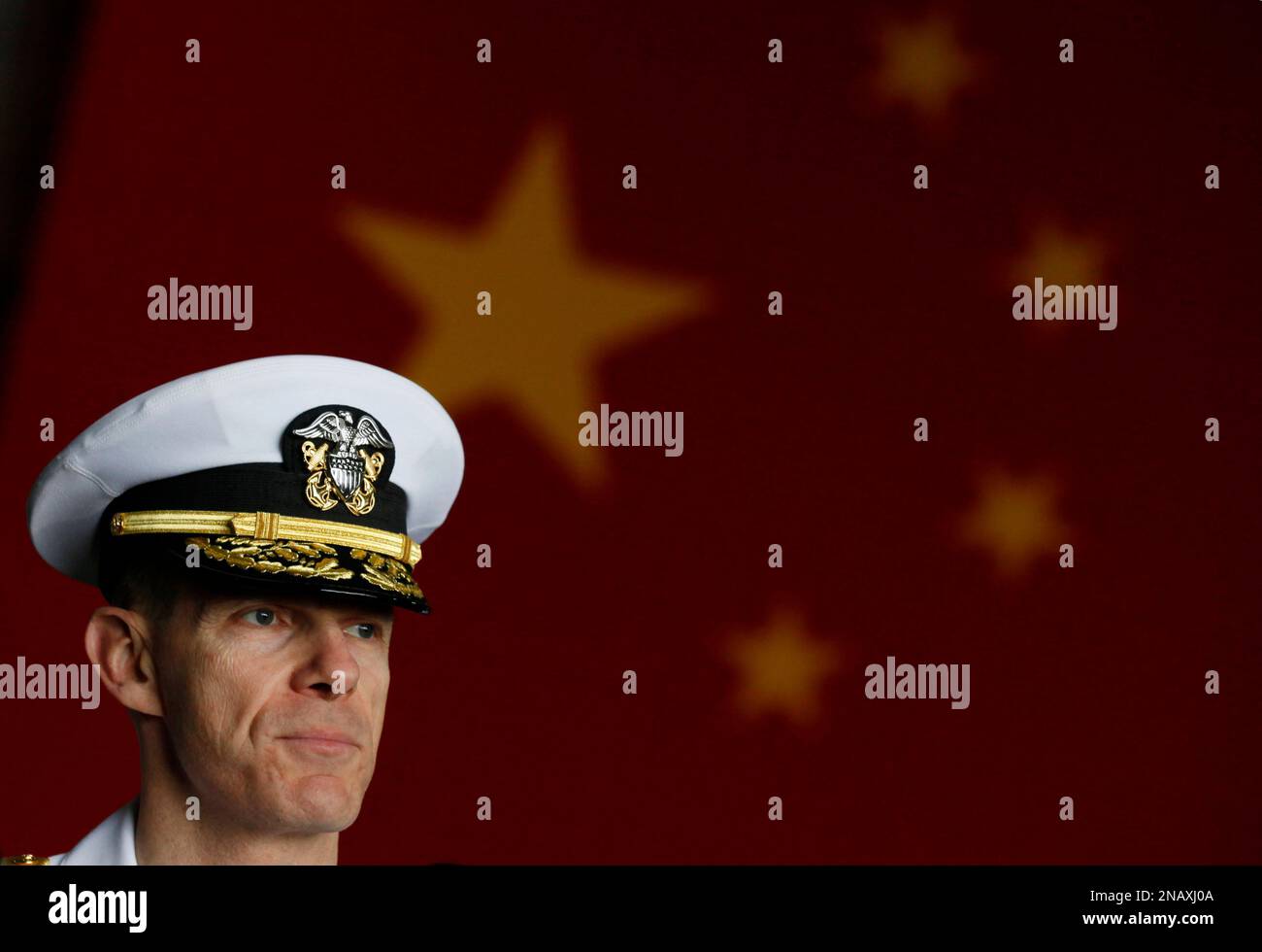 U.S. Navy Rear Admiral J.R. Haley speaks to media on the aircraft ...