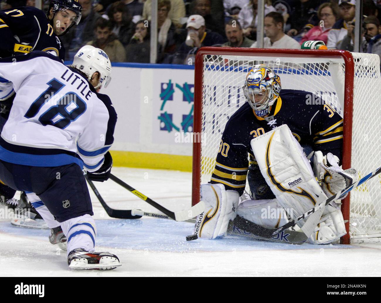 Buffalo Sabres goalie Ryan Miller makes a save on a shot by Winnipeg ...