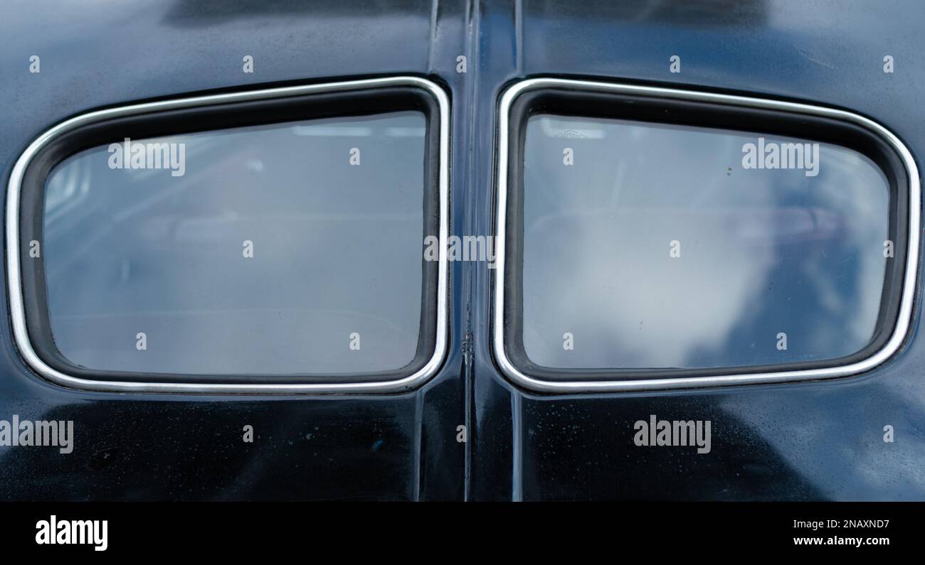 A closeup shot of the rear windows of an old car Stock Photo - Alamy