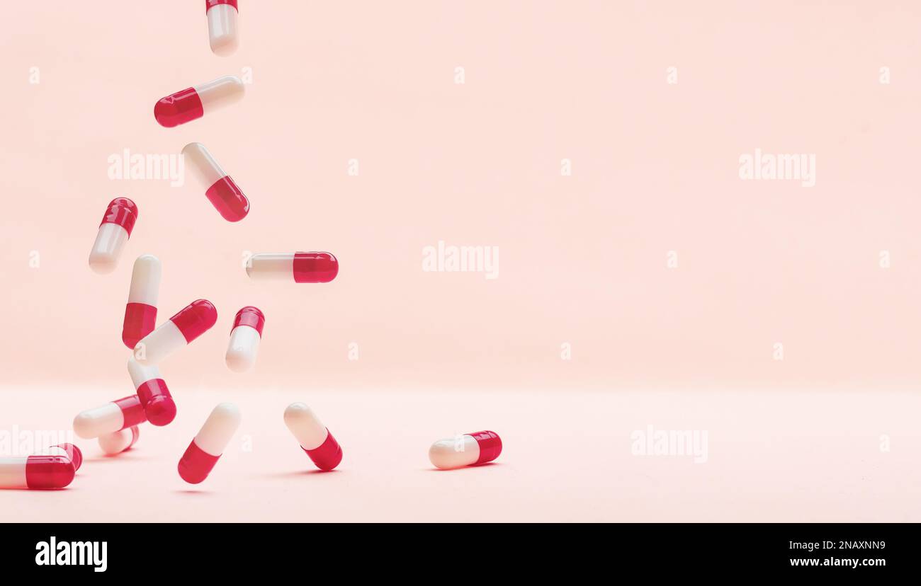 Red white capsules fall hi-res stock photography and images - Alamy