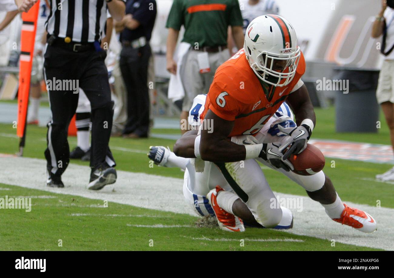Miami Hurricanes running back Lamar Miller (6) runs for a first down in ...