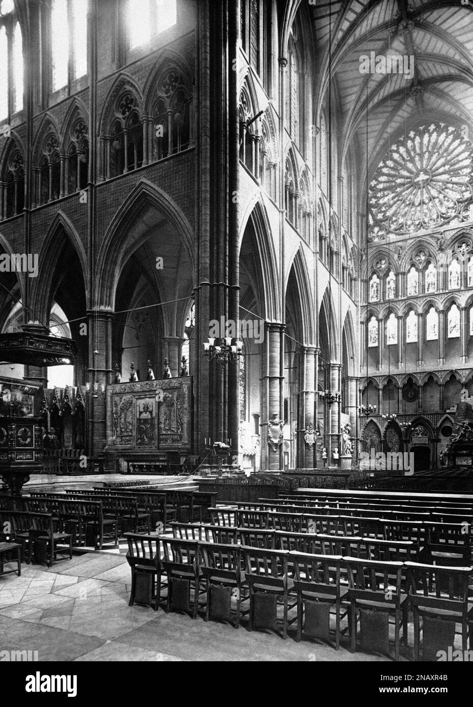 A view looking down the Nave up to the Rose Windsor in Westminster ...