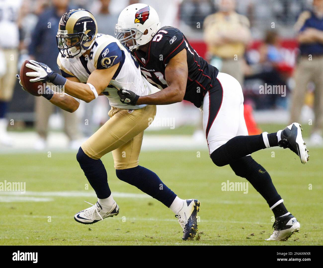 St. Louis Rams wide receiver Greg Salas (87) is tackled by Arizona ...